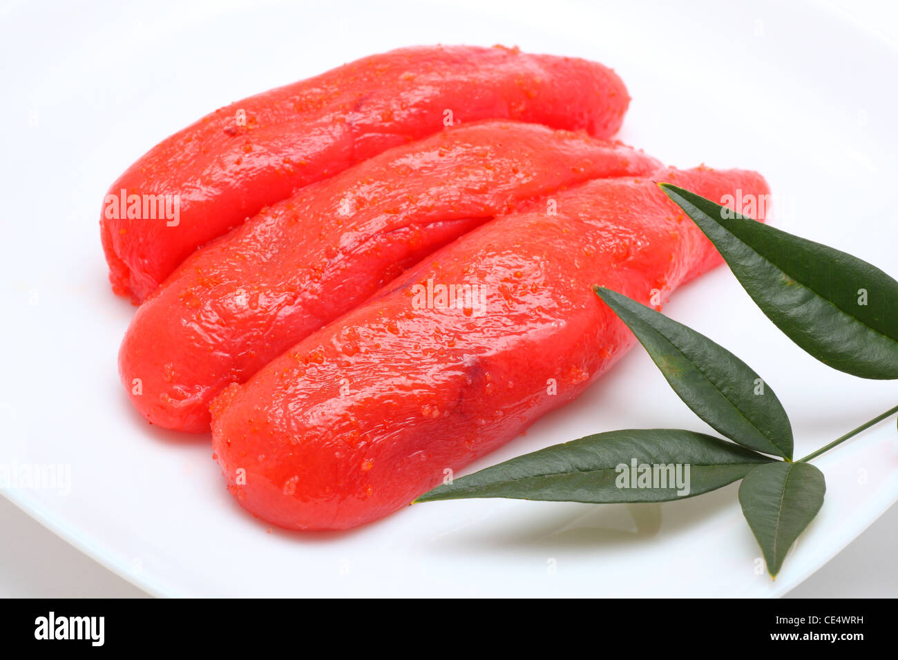 Marinating tarako in hot pepper sauce, japanese food Stock Photo - Alamy