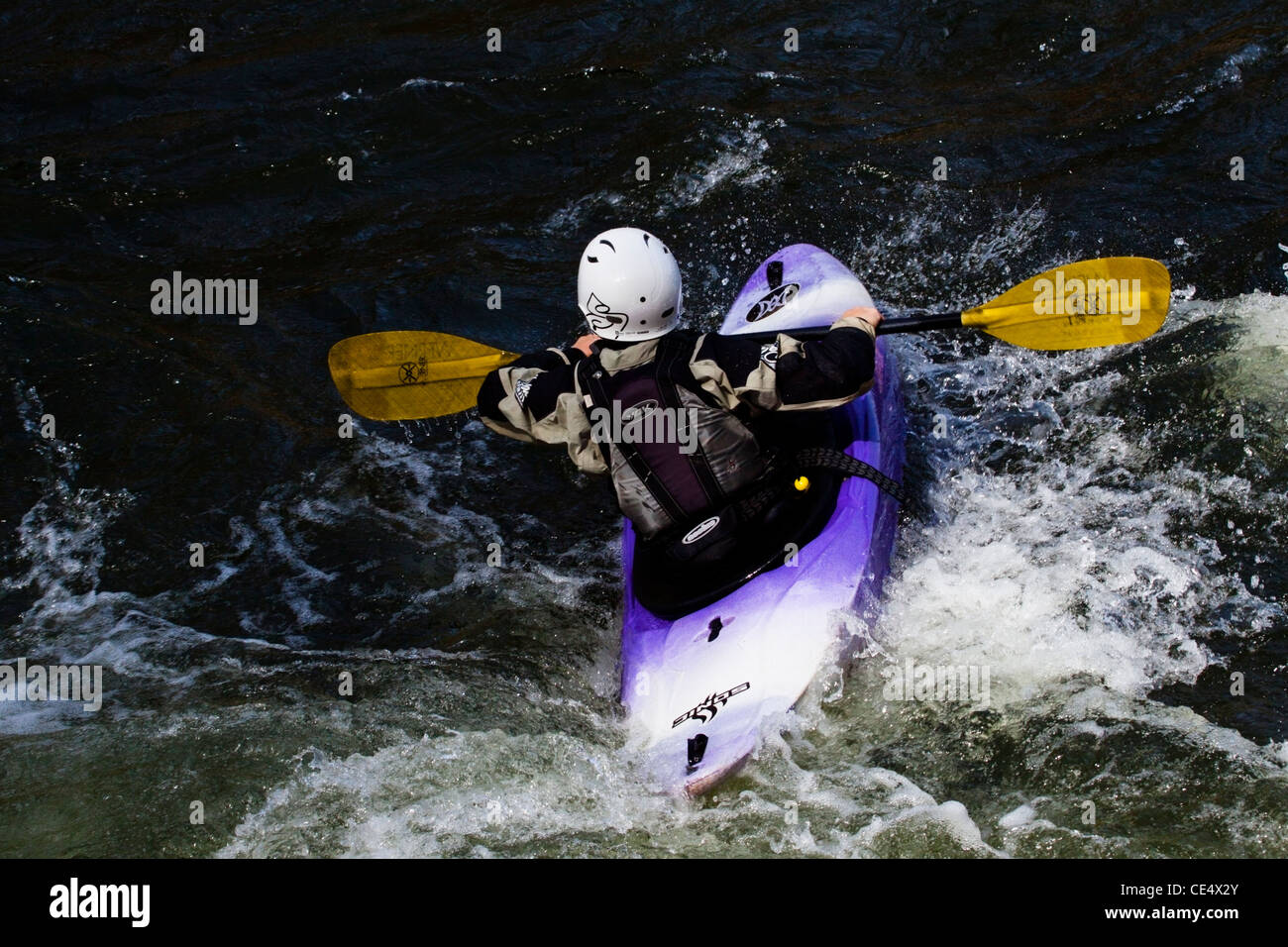Kayaking in the rapids on a river Stock Photo - Alamy