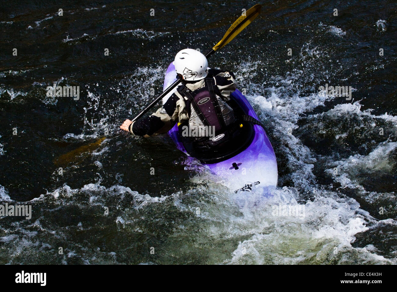 Kayaking in the rapids on a river Stock Photo - Alamy