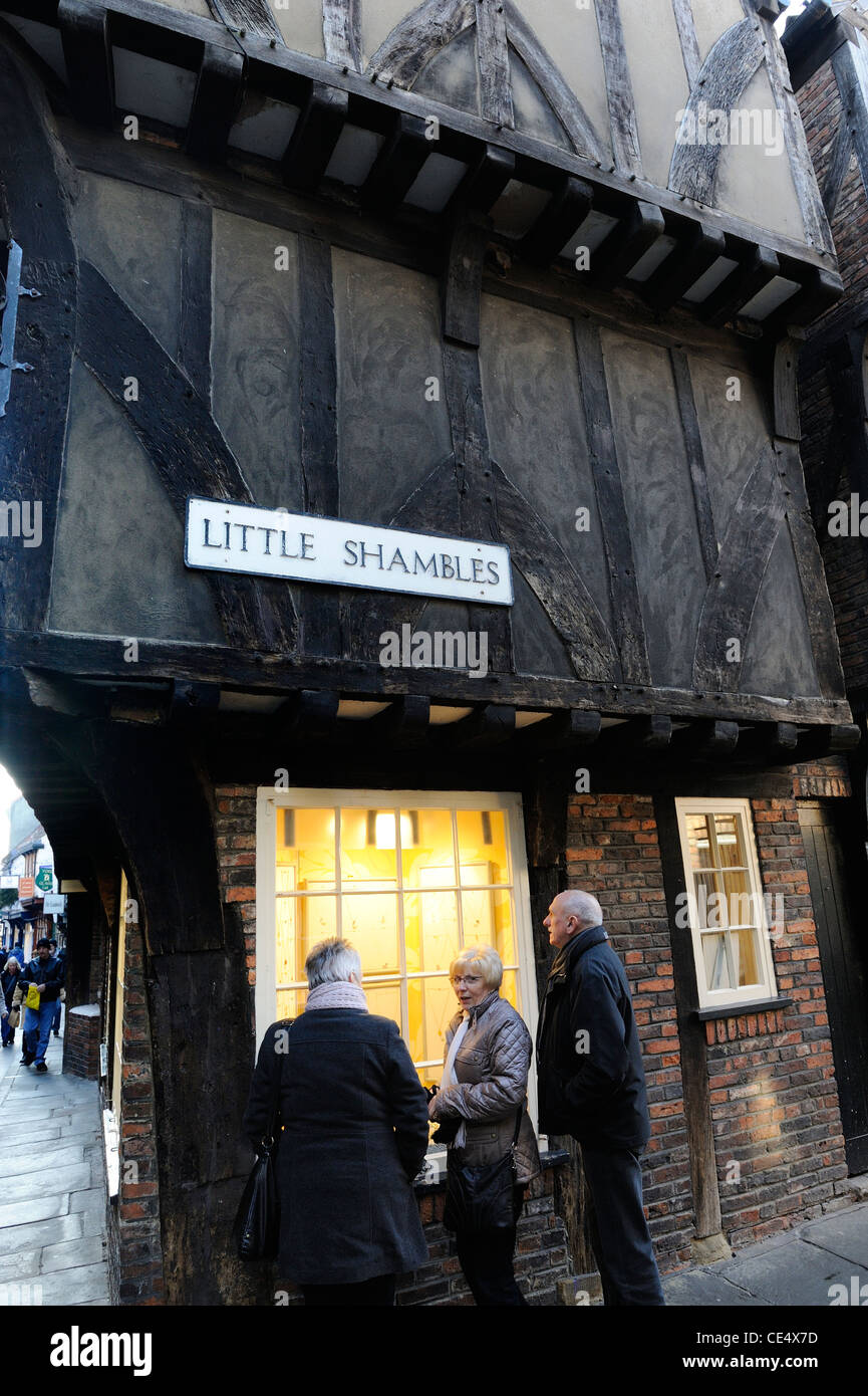 tourists looking in a jewelery shop window in the historic little ...