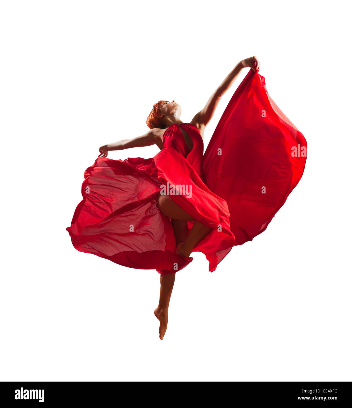 Gorgeous young flying dancer wearing red dress Stock Photo - Alamy