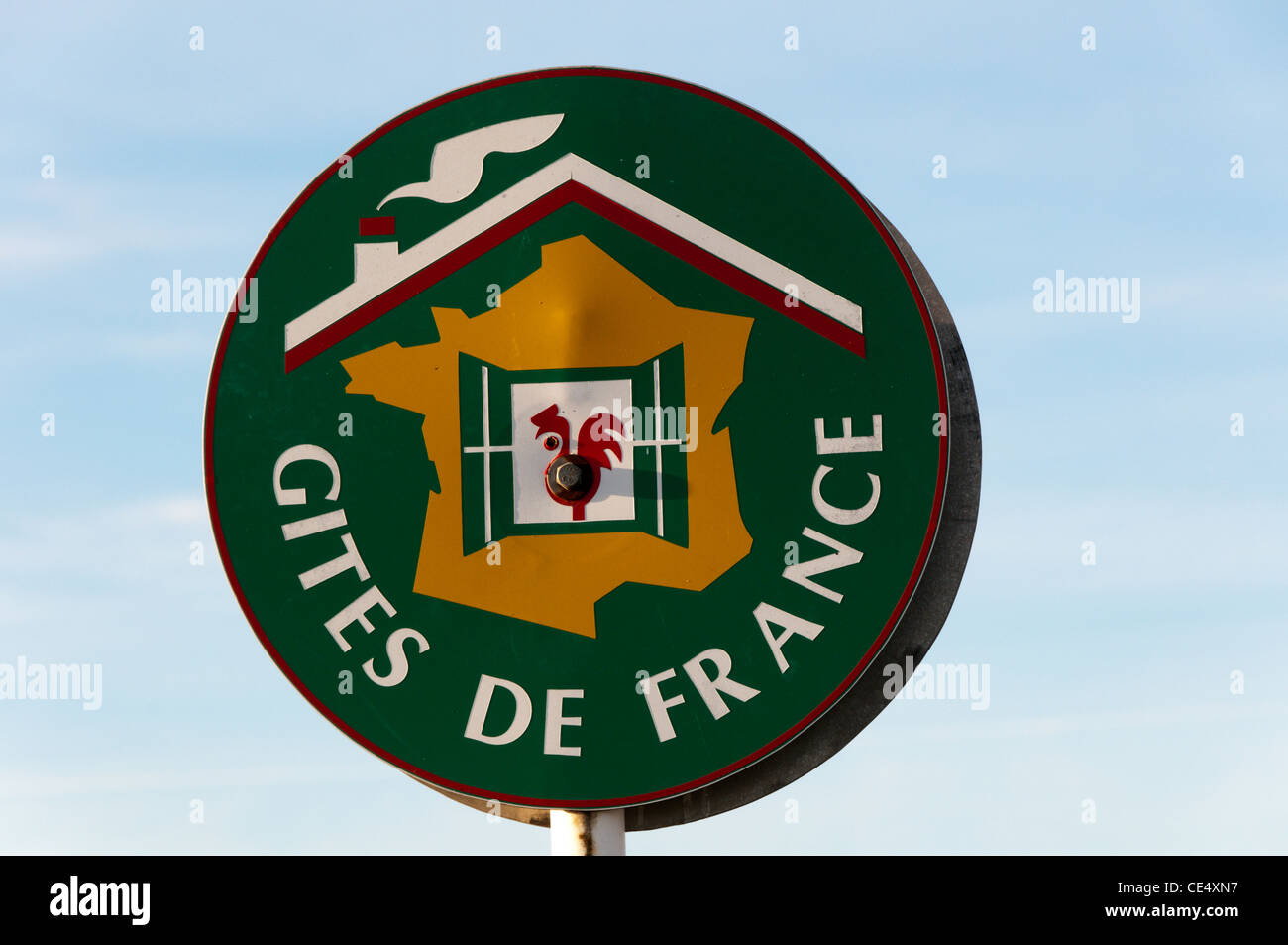 A circular metal Gites de France sign Stock Photo - Alamy