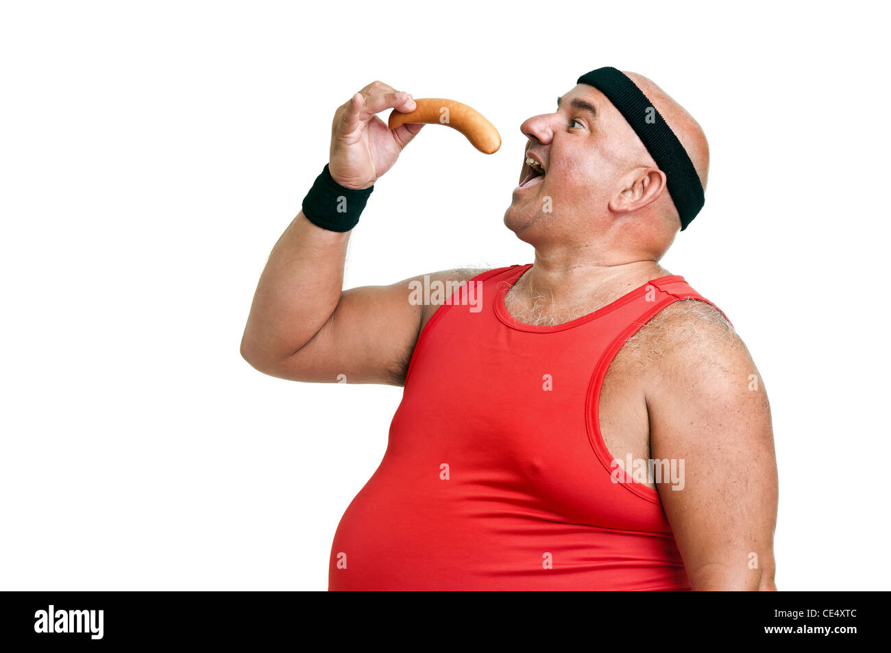 Large "fitness" man with a big sausage isolated in white Stock Photo ...