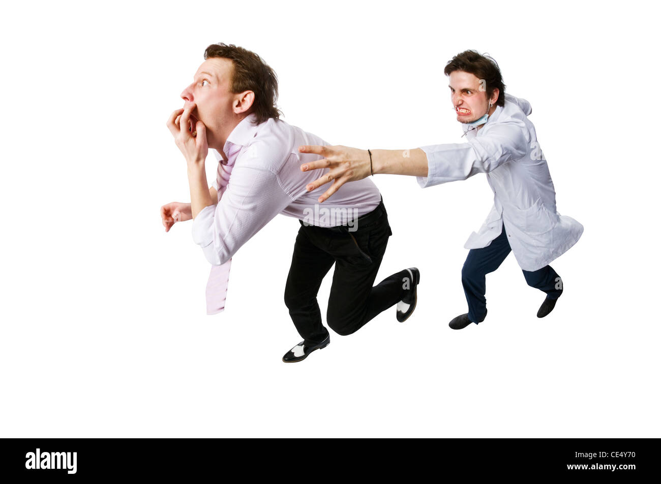 Patient running away from a doctor isolated on white Stock Photo - Alamy