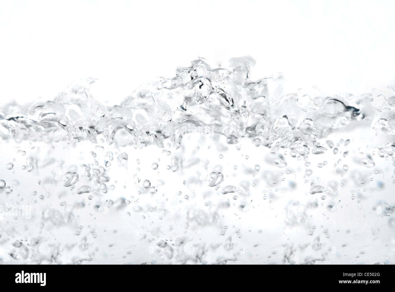 Splashing of water on a white background Stock Photo - Alamy