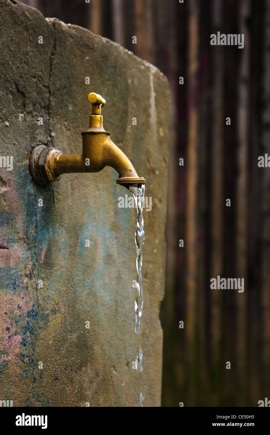 Old rusty water tap Stock Photo - Alamy