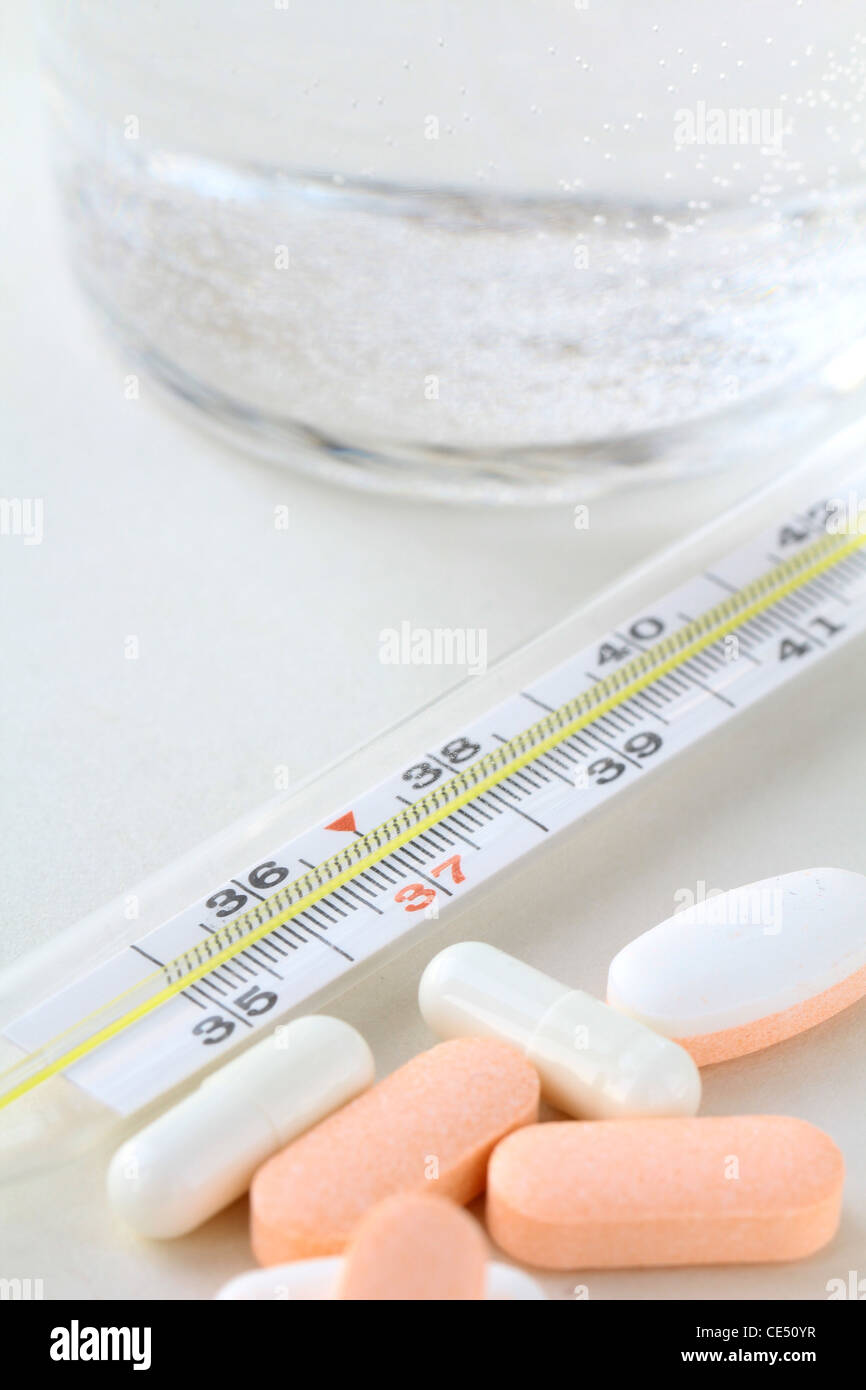 Medical pills thermometer glass water hi-res stock photography and ...