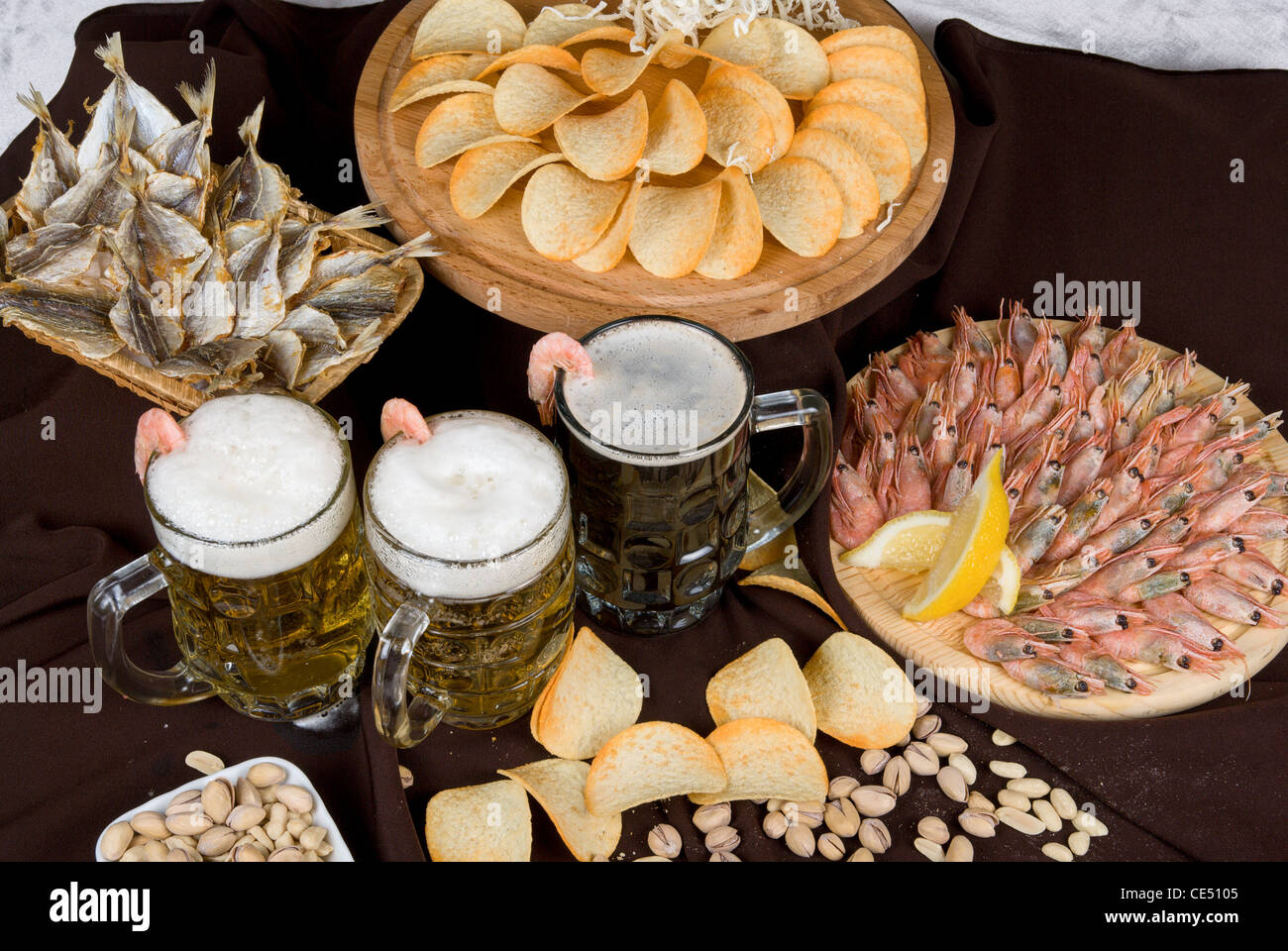 Beer and snacks set of chips, pistachio, shrimp and fish Stock Photo ...