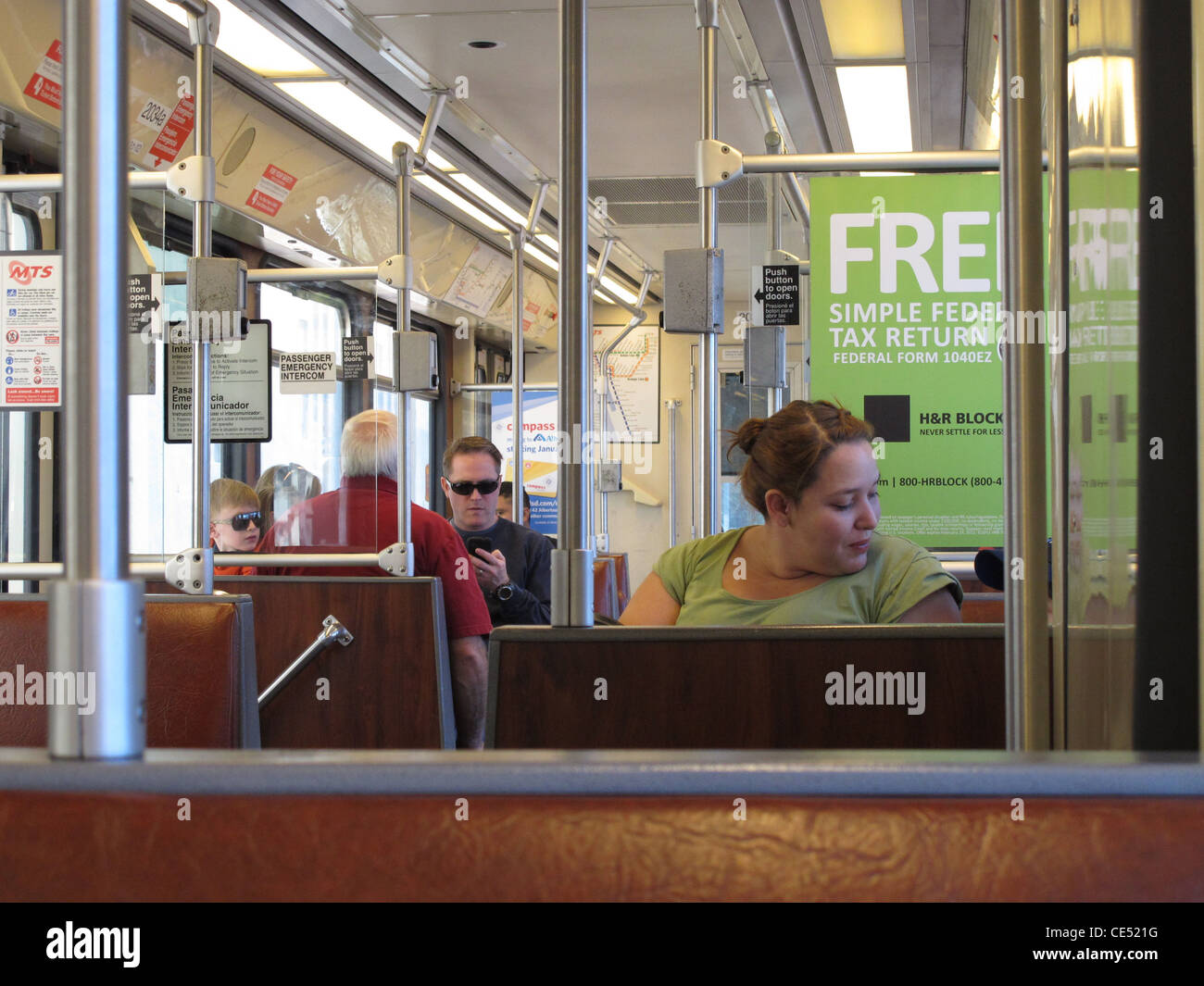 Riders on the MTS trolley in San Diego California Stock Photo - Alamy