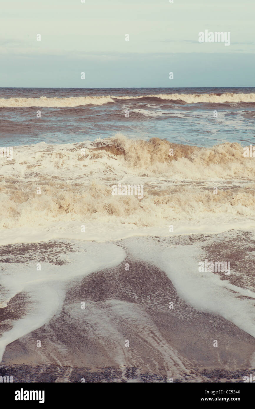 High tide waves at Eccles-on-Sea, Norfolk, UK Stock Photo - Alamy