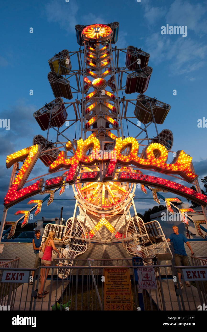 Carnival rides at dusk hi-res stock photography and images - Alamy