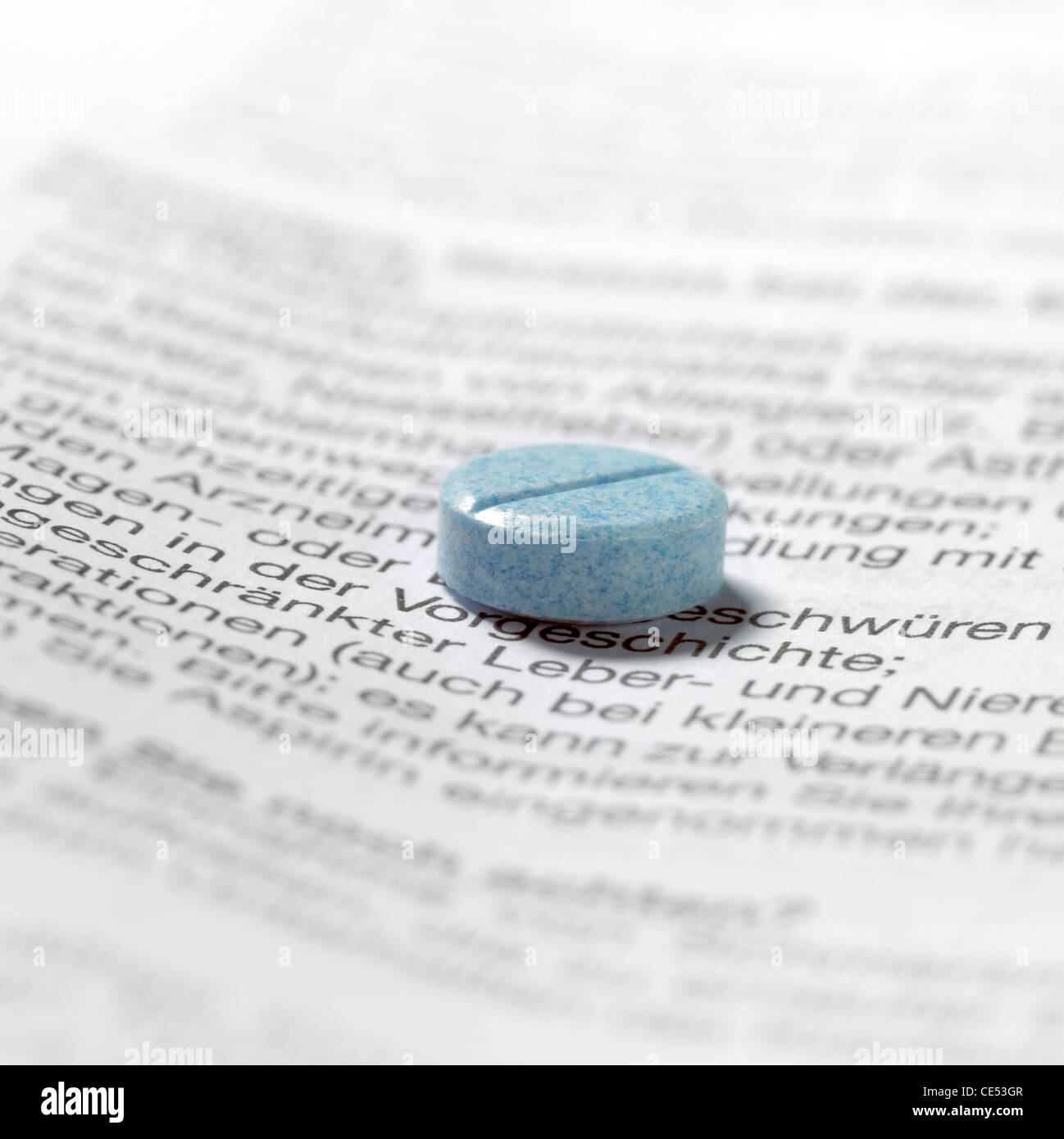 studio shot of a blue pill on package insert Stock Photo - Alamy