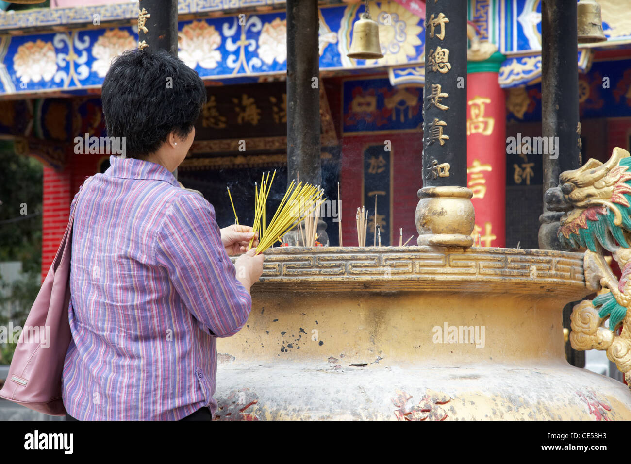 Burning joss sticks hi-res stock photography and images - Alamy