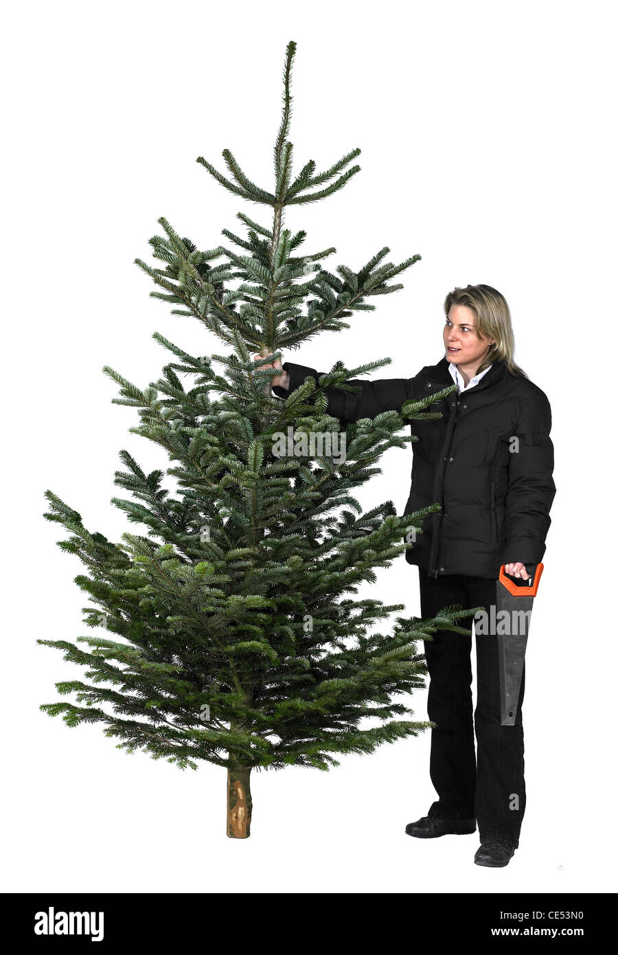 young woman and christmas tree in white back Stock Photo - Alamy