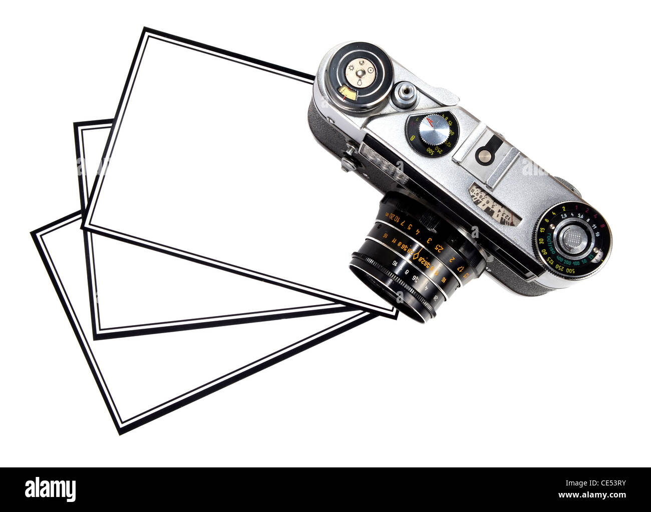 old retro photo camera and blank photo isolated on white background ...