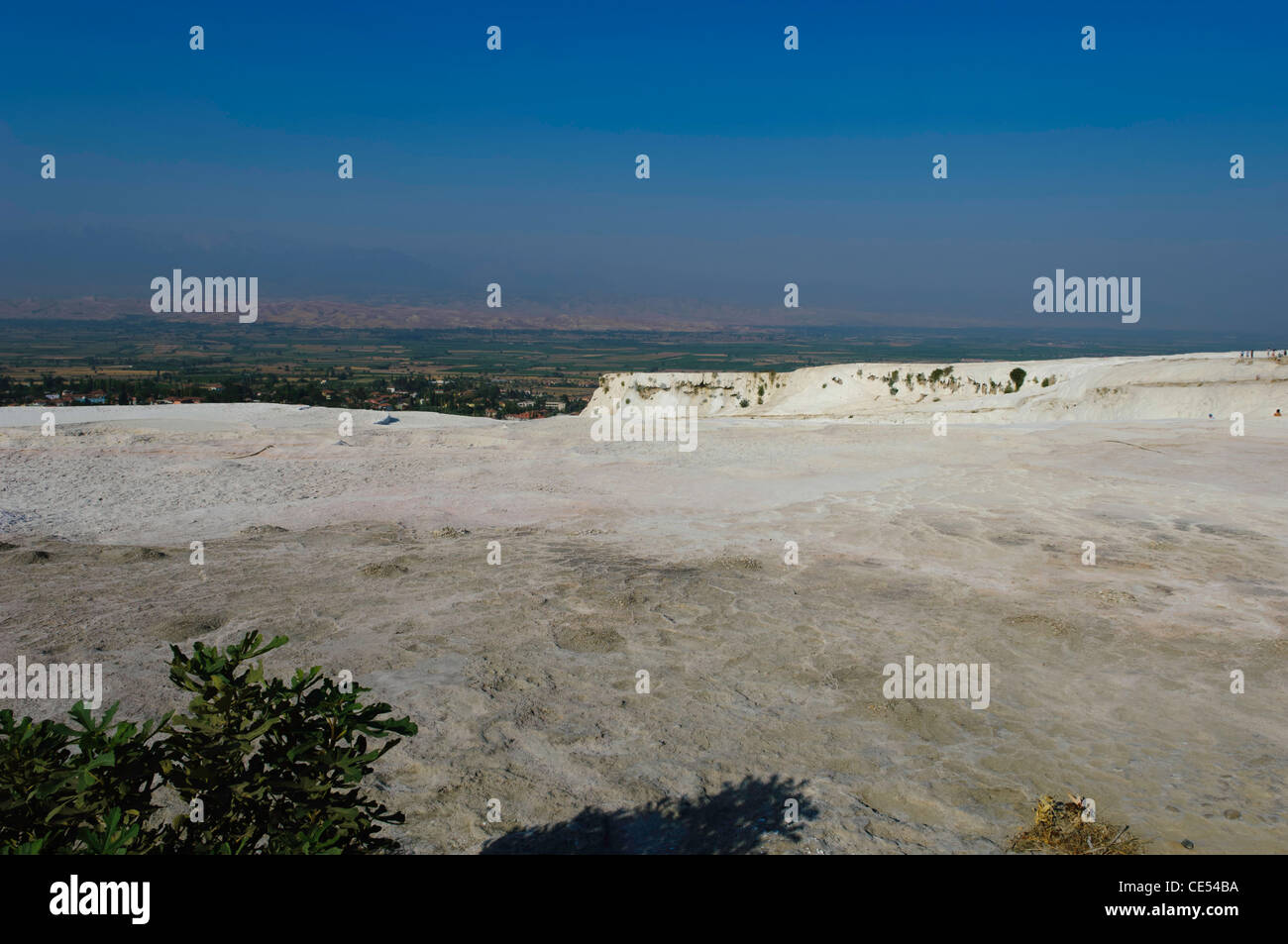Travertine terraces of calcium carbonate minerals left by flowing water ...