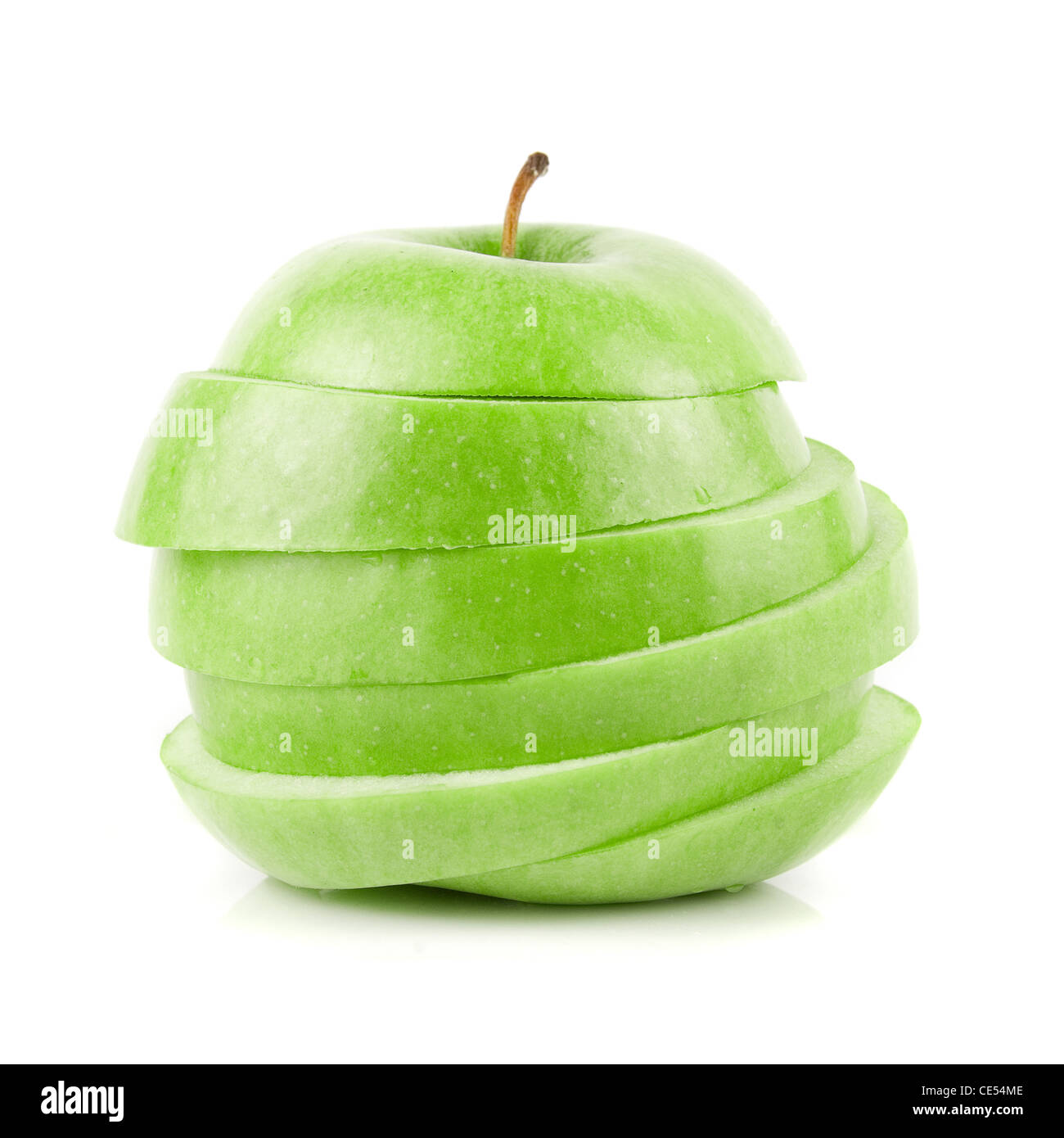 Sliced green apple isolated on a white background Stock Photo - Alamy