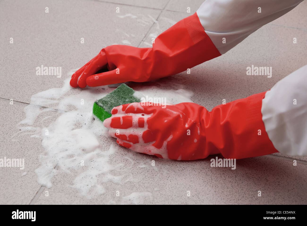 protecting hand from detergents, washing floor by cleaning sponge Stock ...