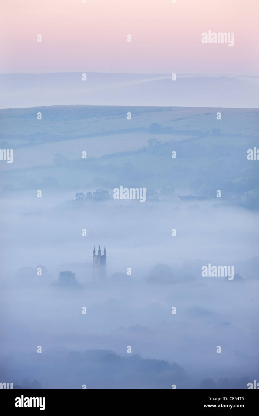 Widecombe-in-the-Moor Church surrounded by mist at dawn, Dartmoor ...