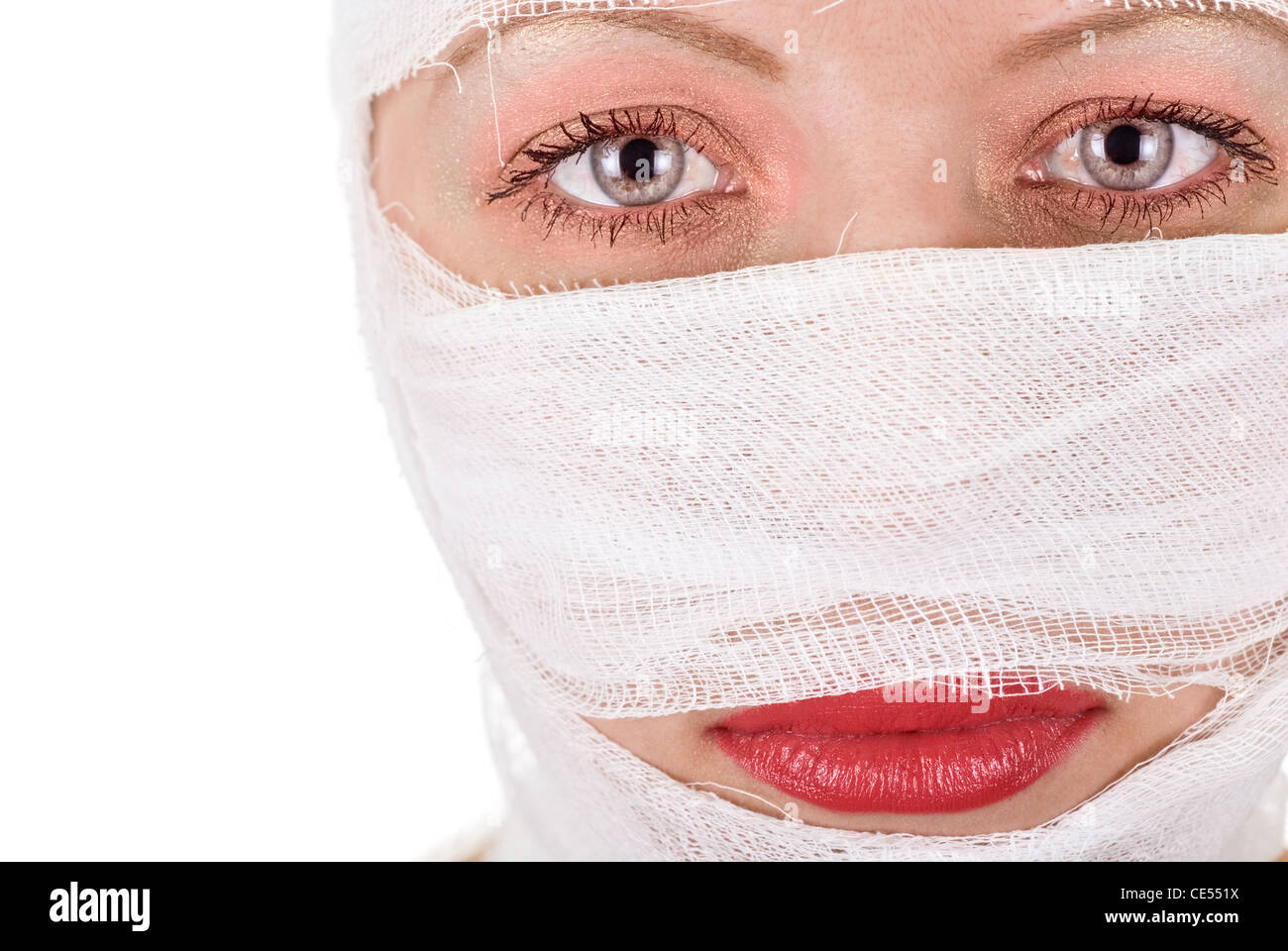 woman with bandages on her face closeup on white Stock Photo - Alamy