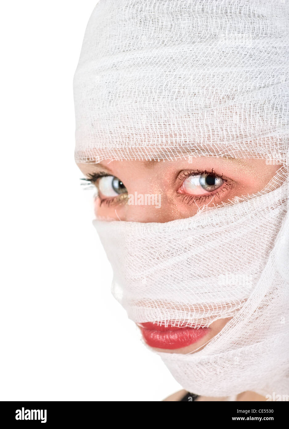 woman with bandages on her face on white Stock Photo - Alamy