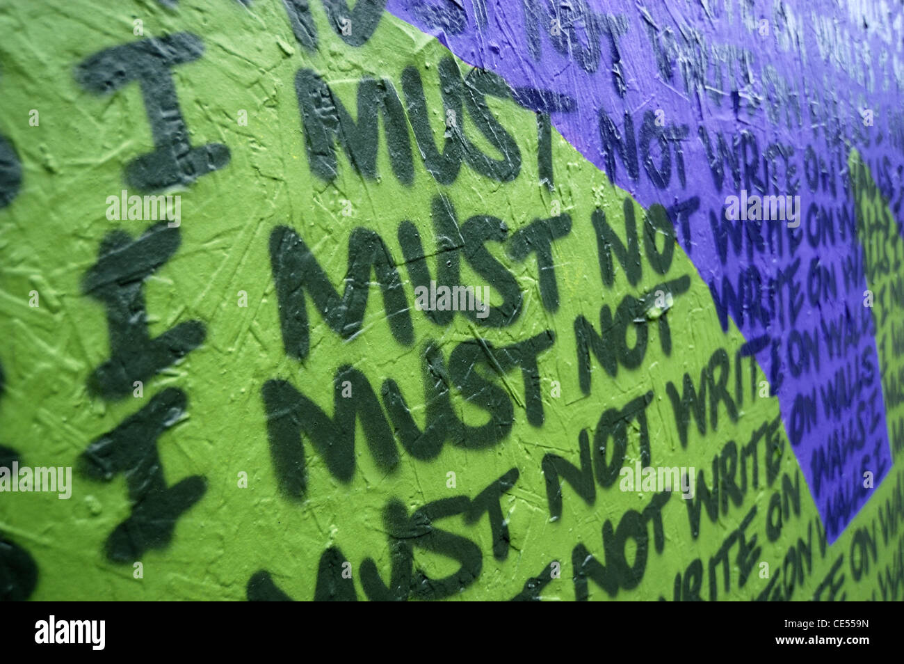 'I Must Not Write on Walls', a graffiti wall in Stokes Croft, Bristol ...