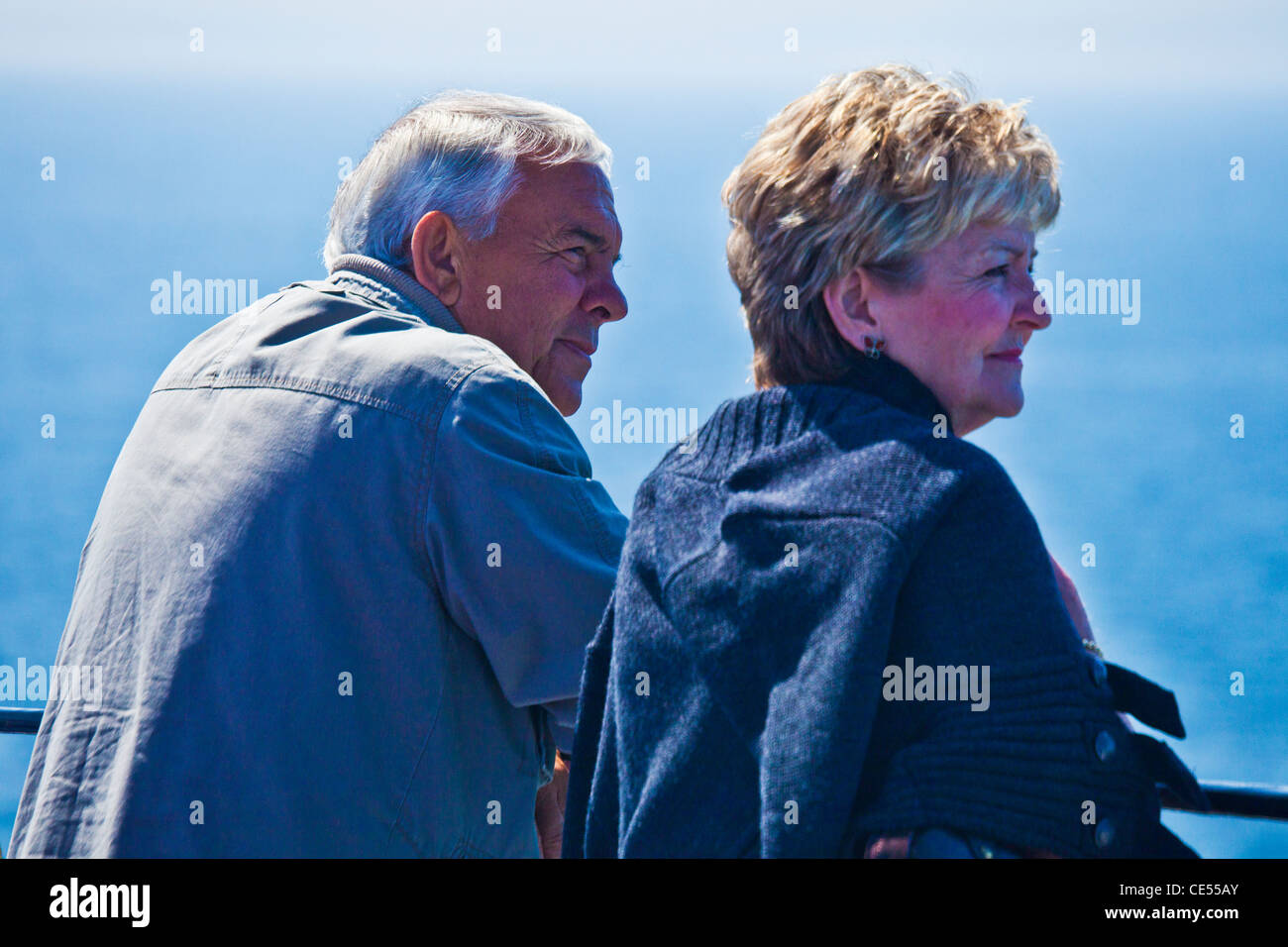 Couple leaning on rail of cruise ship hi-res stock photography and ...