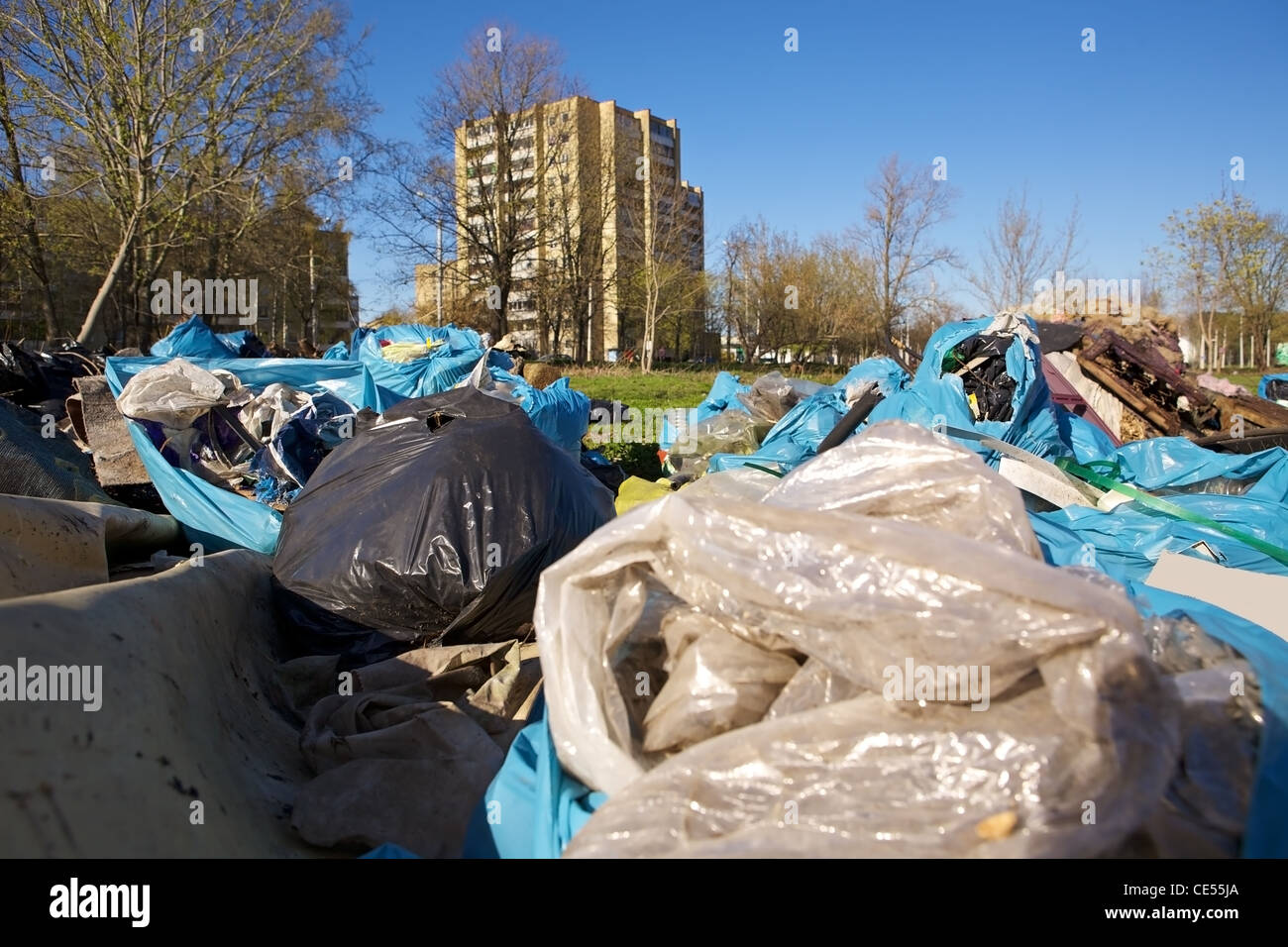 Garbage on the houses background Stock Photo - Alamy