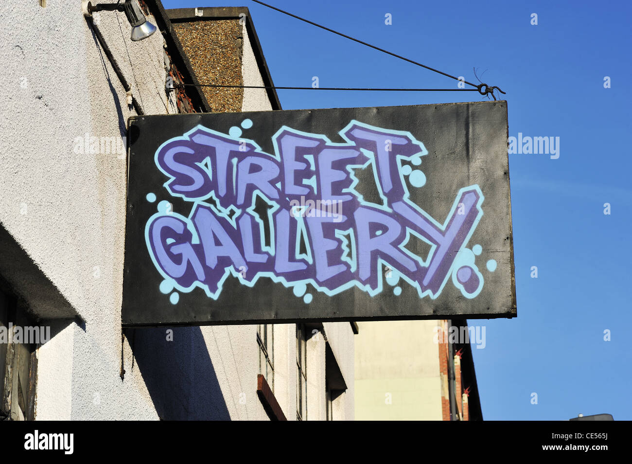 A street gallery sign, Stokes Croft, Bristol Stock Photo - Alamy