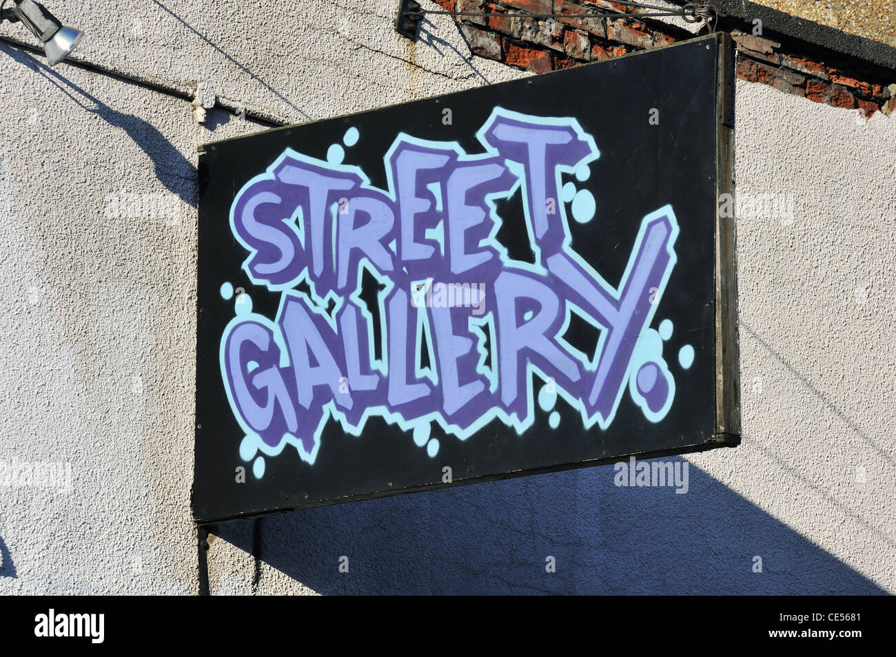 A street gallery sign, Stokes Croft, Bristol Stock Photo - Alamy