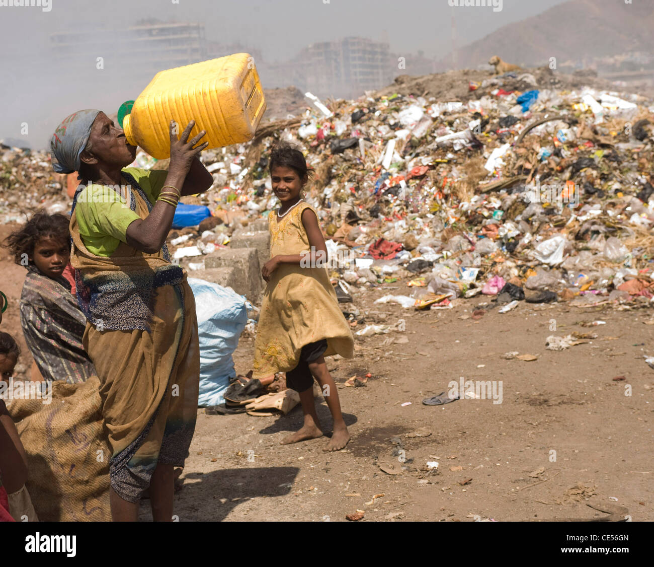 A family of rag pickers pictured on a dump in Virar situated on the ...