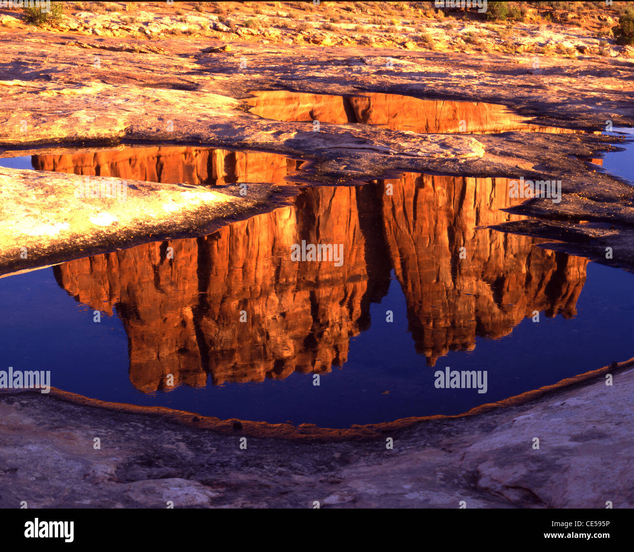 The Organ reflected in pool in Courthouse Wash in Arches National Park ...