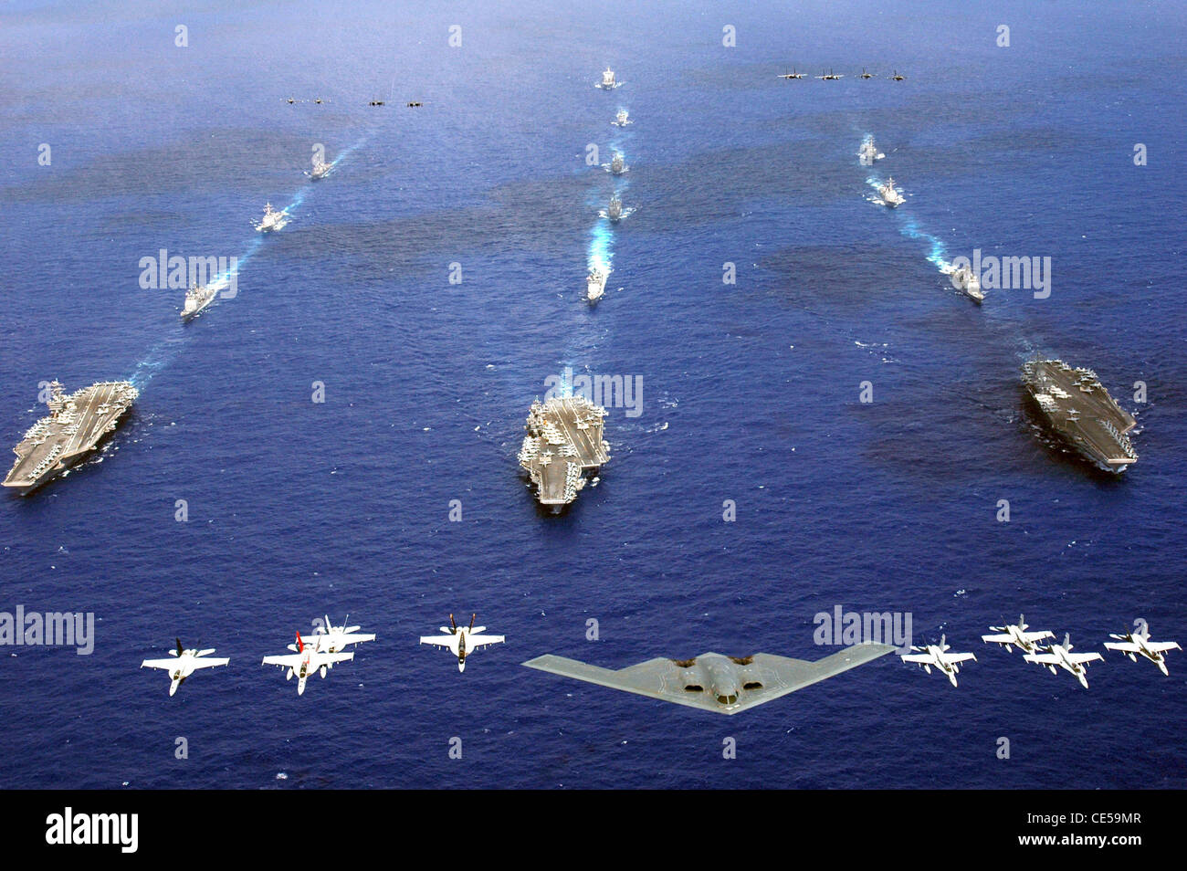 Aircraft fly over uss hi-res stock photography and images - Alamy