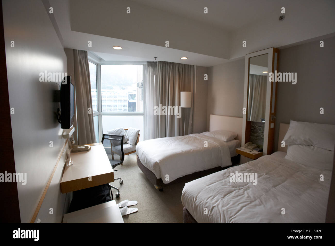 small hong kong hotel twin bedroom hksar china asia Stock Photo - Alamy