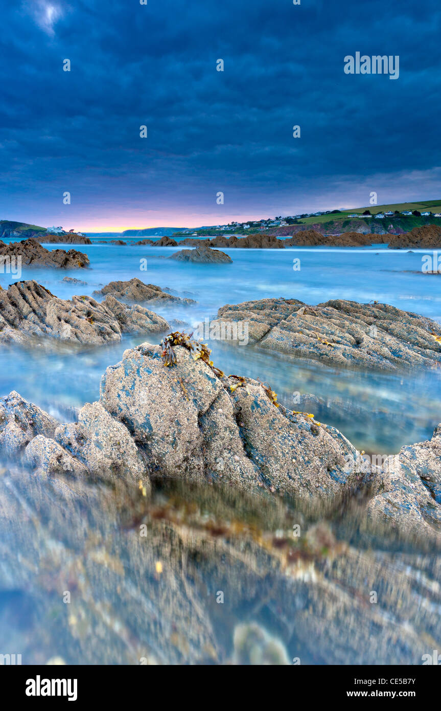 Rocky shores of Bantham at Dusk, Bantham, South Devon, England, United ...