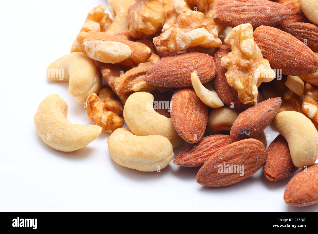 Mixed nuts on white background Stock Photo - Alamy