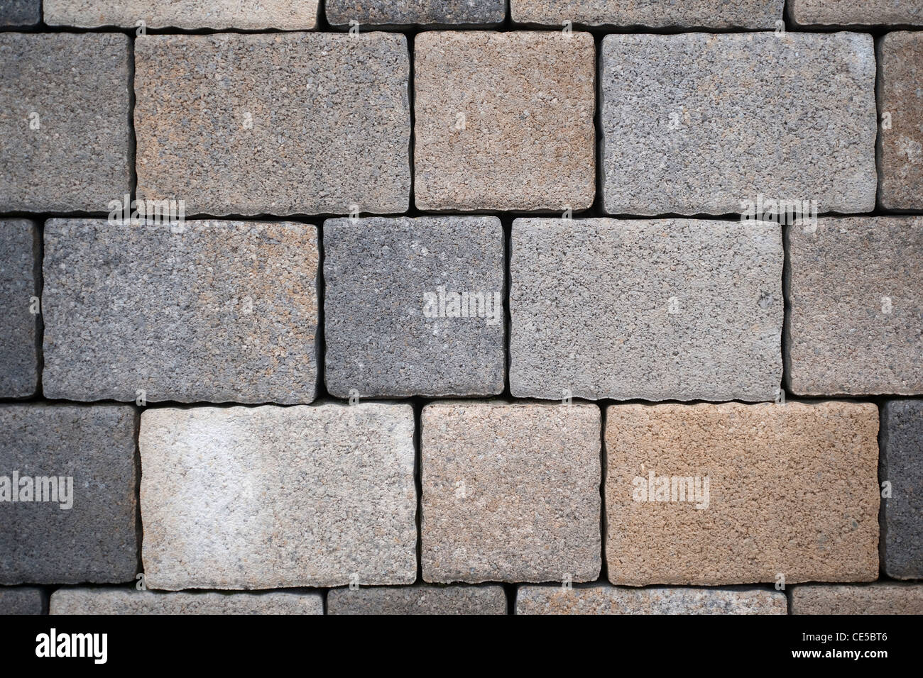 Background from paving stones, rectangular stones in gray shades of ...