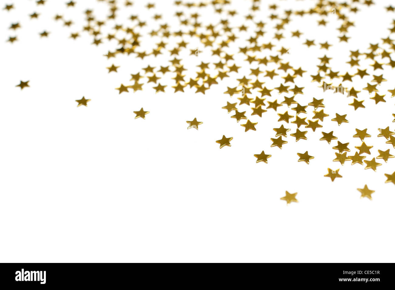 Many golden stars, isolated on white background Stock Photo - Alamy