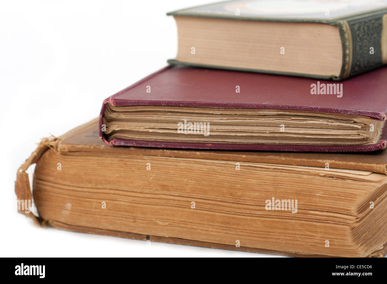 Stack of antique books on isolated background Stock Photo - Alamy