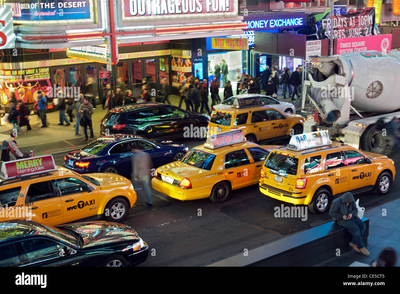 Taxis in Times Square Stock Photo - Alamy