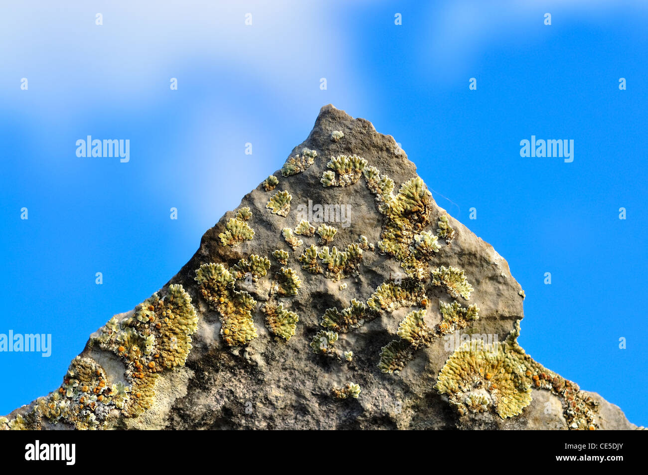 Triangle rock and blue sky Stock Photo - Alamy