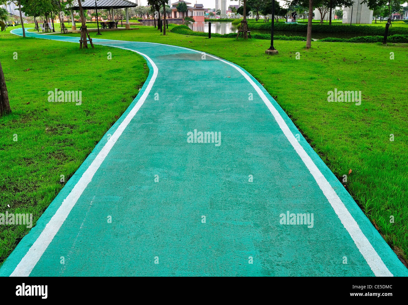 Green footpath in a park Stock Photo - Alamy