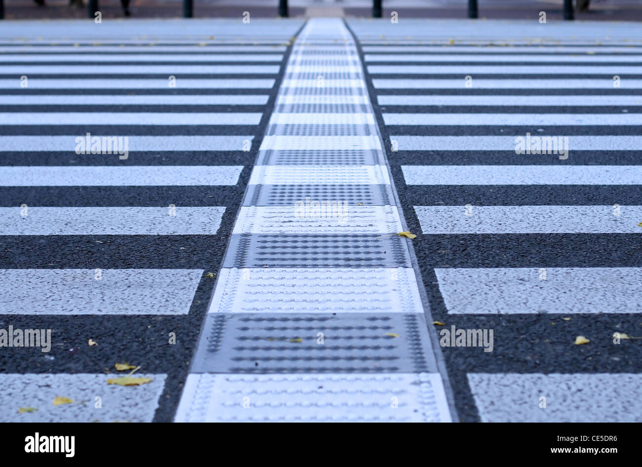 Very low perspective and selective focus of a pedestrian crossing ...