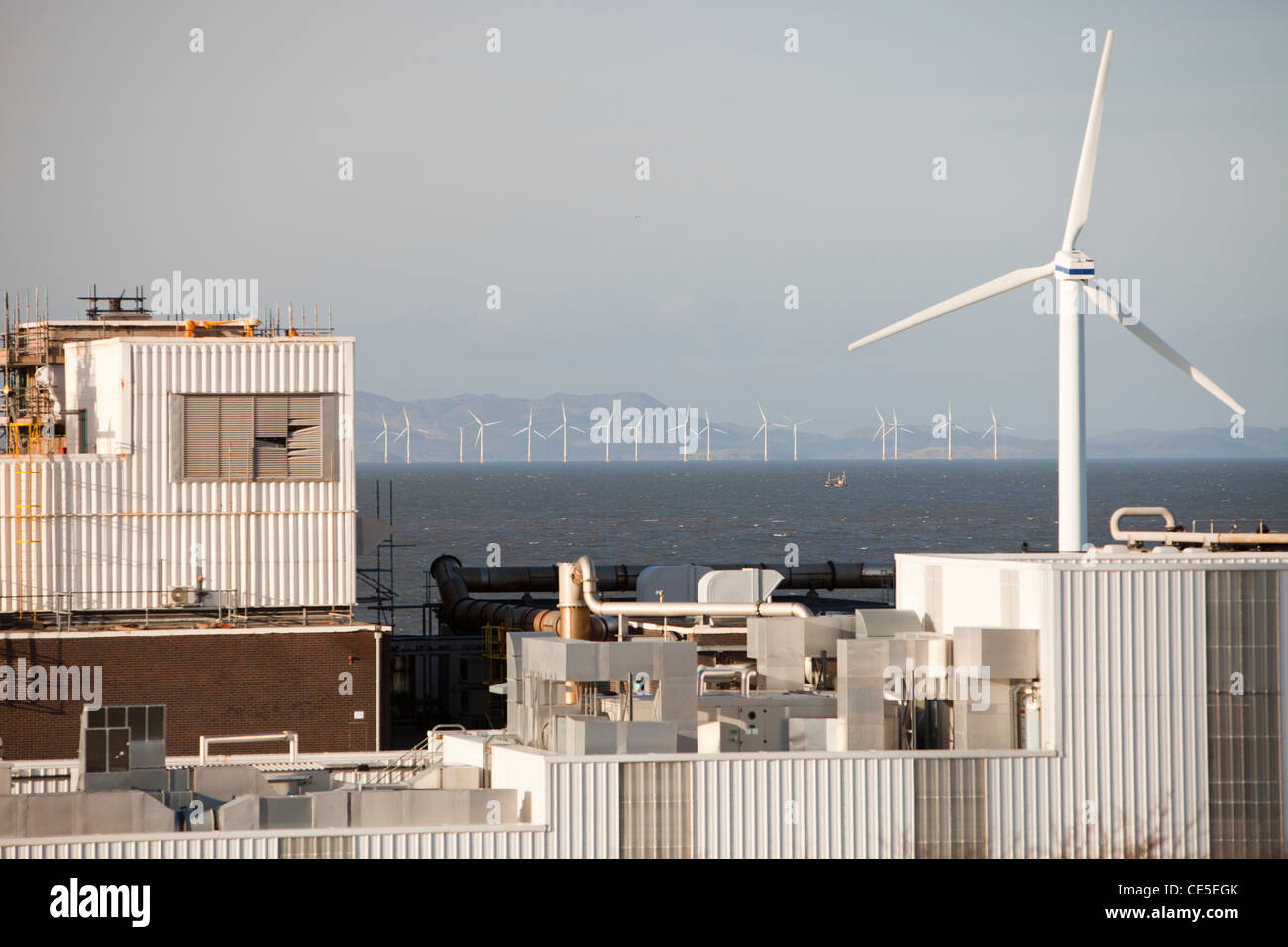The Kodak factory in Workington Cumbria, with a wind turbine helping to ...