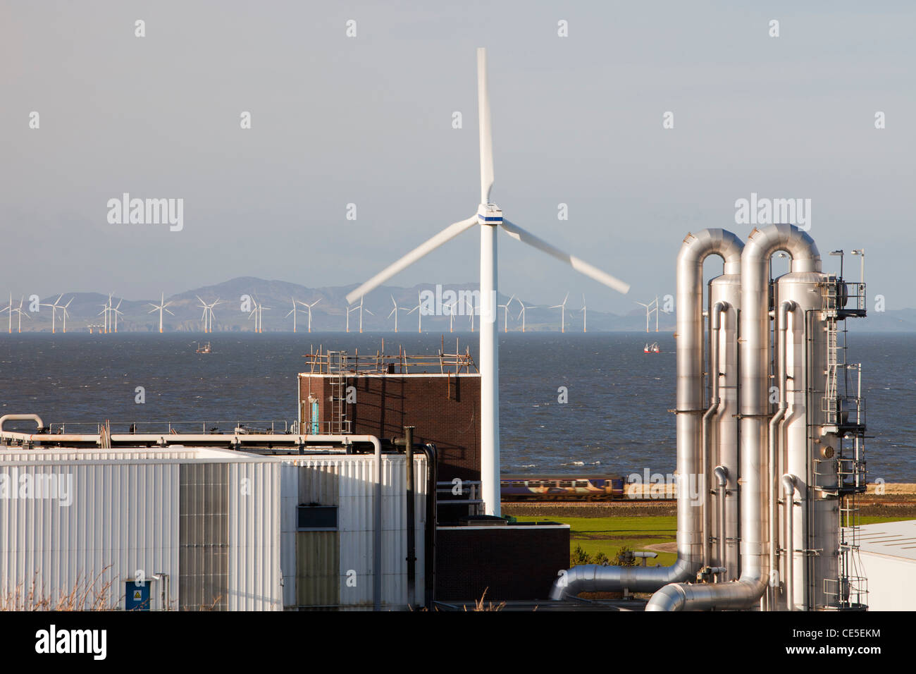 The Kodak factory in Workington Cumbria, with a wind turbine helping to ...