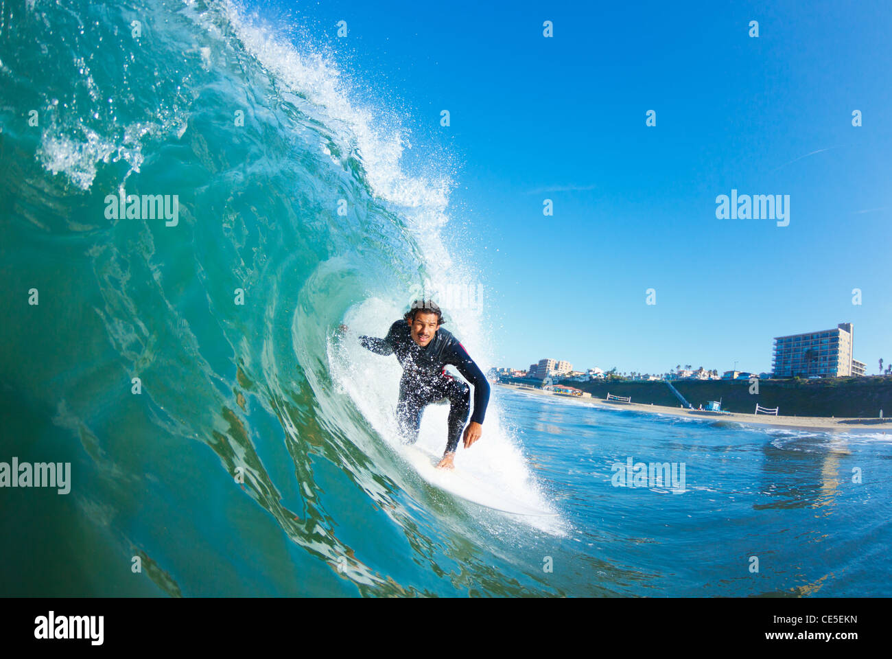 Surfer On Blue Ocean Wave Stock Photo - Alamy