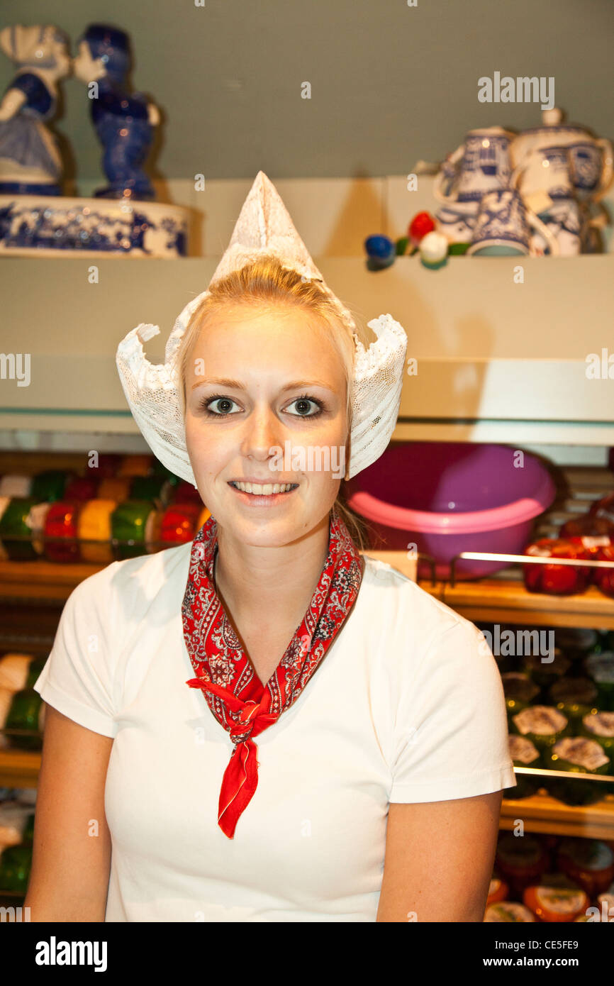 Sales girl in traditional Dutch headdress. Zaanse Schans, The ...