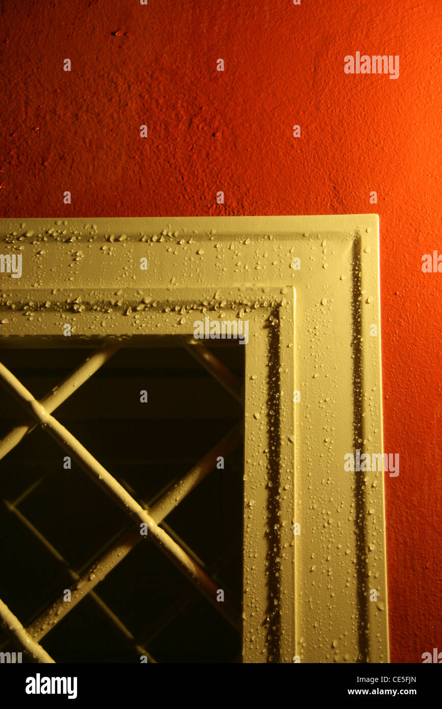 rain drops on metal door frame on house at night Stock Photo - Alamy