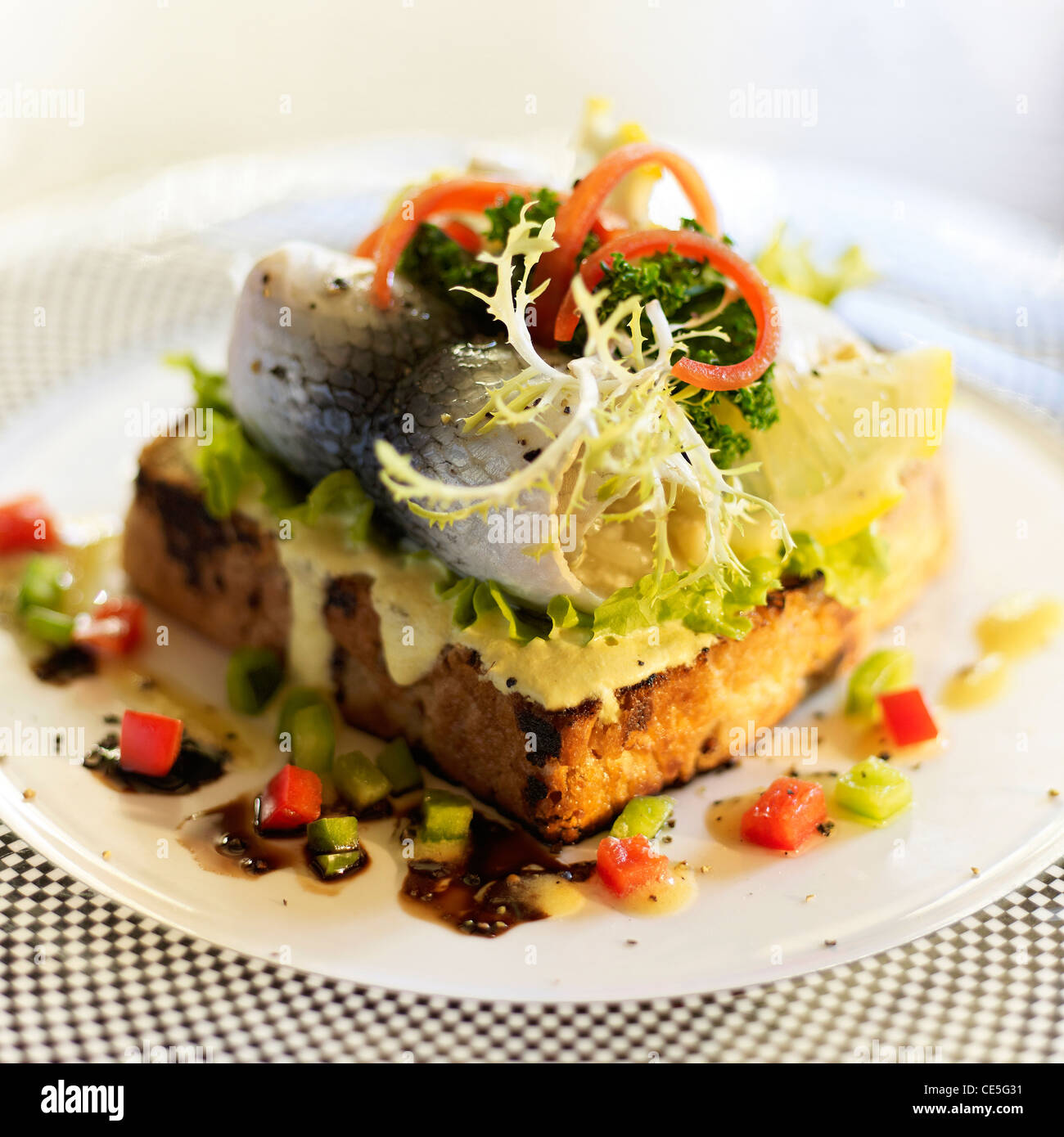 roll mop herring starter on a plate Stock Photo - Alamy