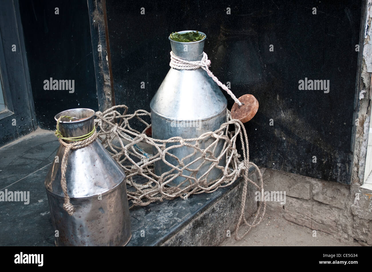 Metal milk containers, Landour, Mussoorie, Uttarakhand, India Stock ...
